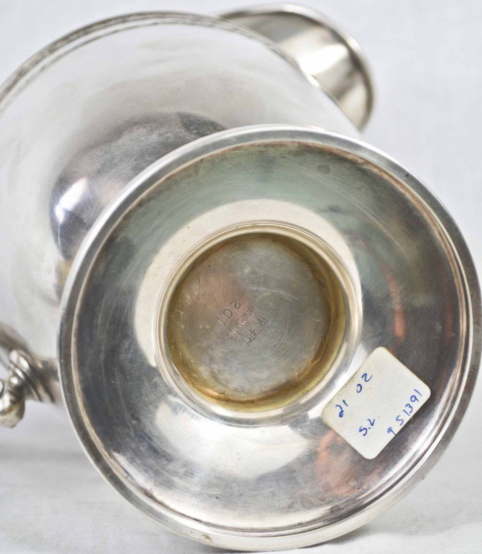 Antique large sterling silver pitcher. Hallmarked
