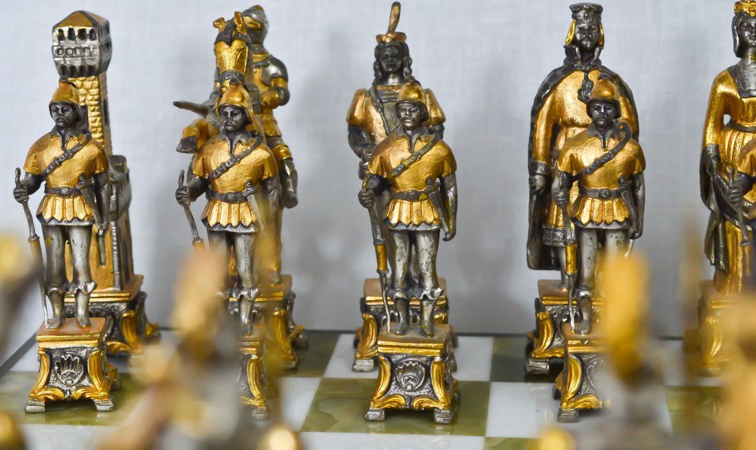 Vintage silver & gold over bronze chess set