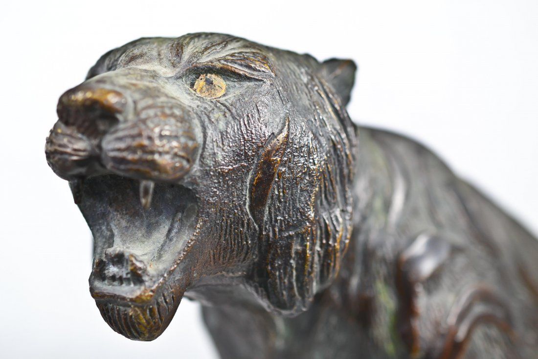 Large antique Chinese bronze tiger. Signed