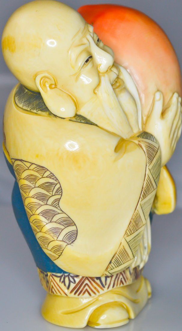 Antique Chinese carved polychrome ivory man