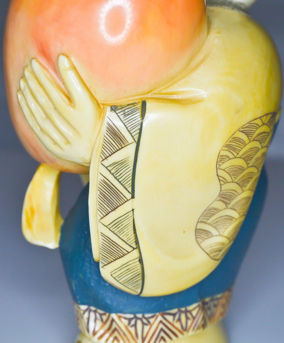 Antique Chinese carved polychrome ivory man