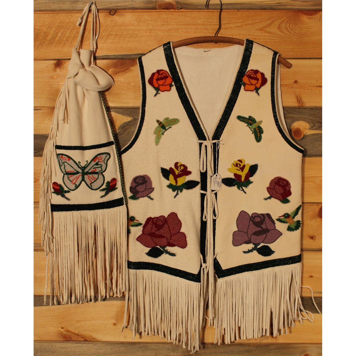 Buckskin vest and bag beaded with flowers and butterflies