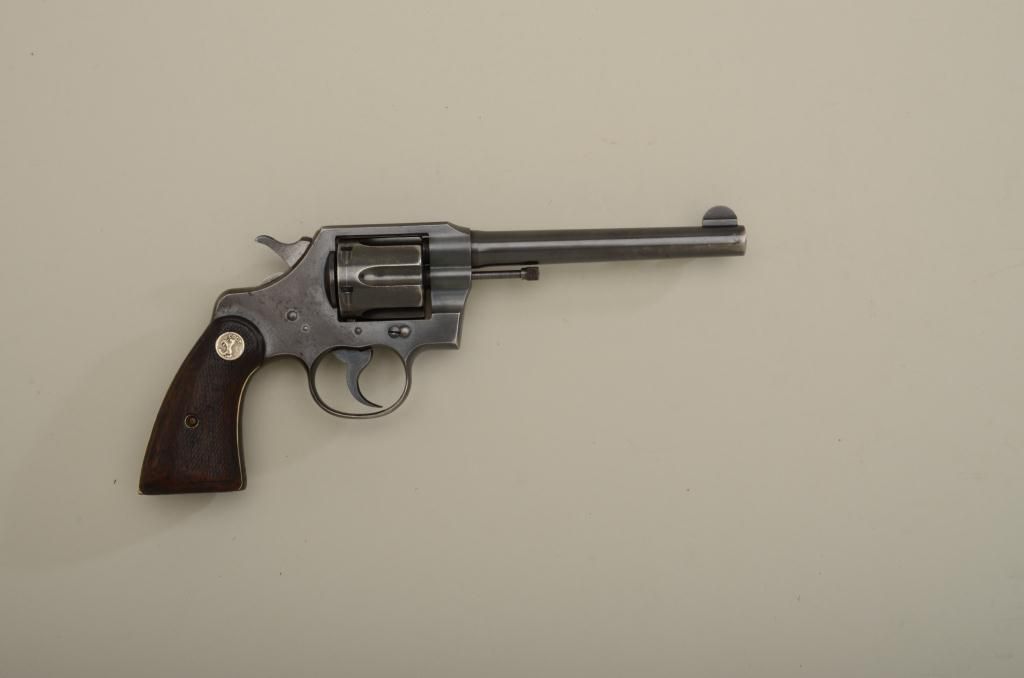 Colt Official Police DA revolver, .38 cal., 6” barrel, blue finish ...