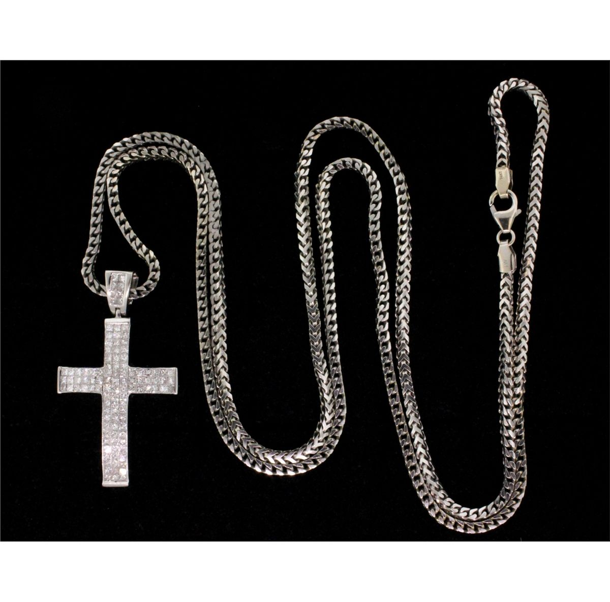 PENDANT: Lady's 14kw "invisible" set diamond cross pendant