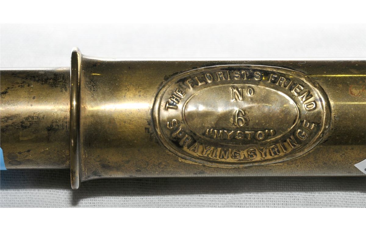 Vintage brass florists friend spraying syringe