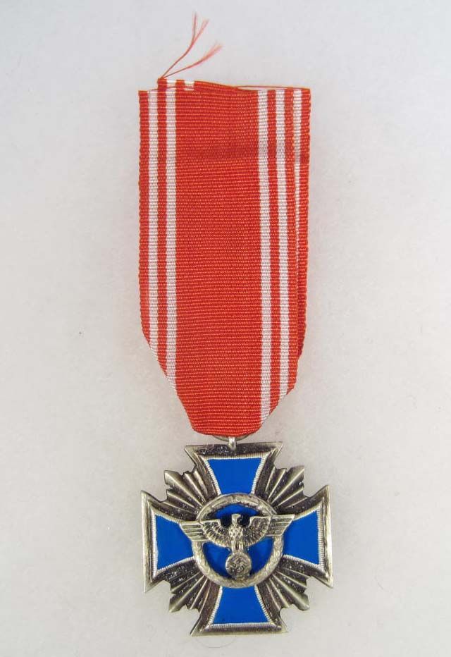 GERMAN NAZI BLUE ENAMELED BADGE W/ RIBBON