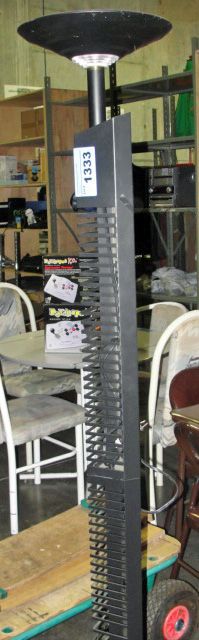 Black halogen floor lamp with CD storage