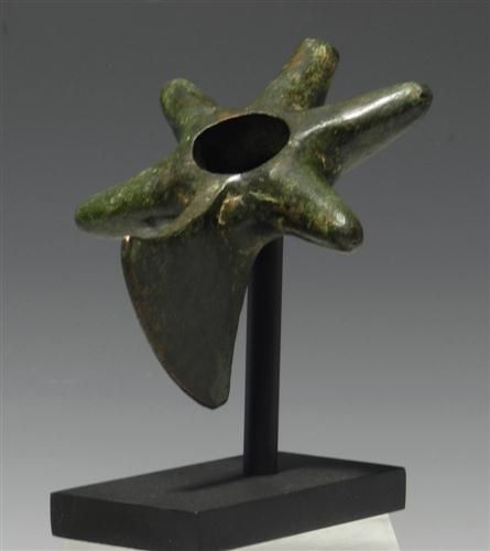 A Spectacular Inca Copper Star Mace Head