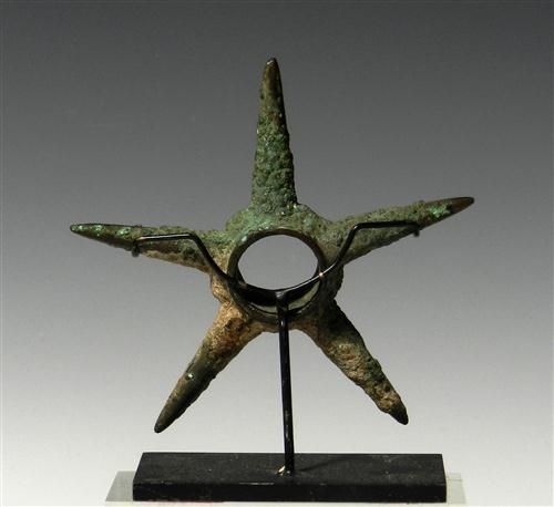 An Inca Bronze Star-Shaped Mace Head