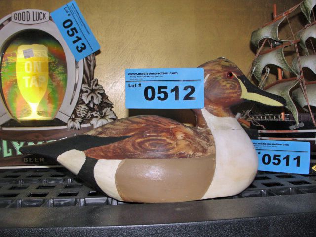 Signed by artist Wayne Joseph carved wooden