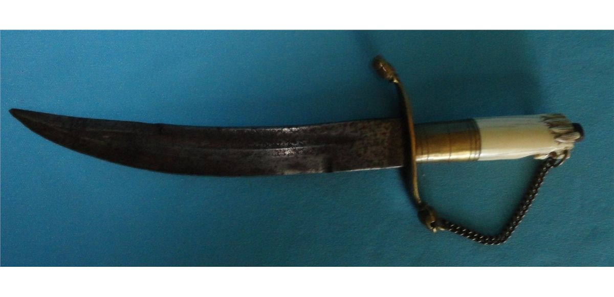 Antique Dagger: Handle in bone, carved lion head. Hilt is brass with 2 ...