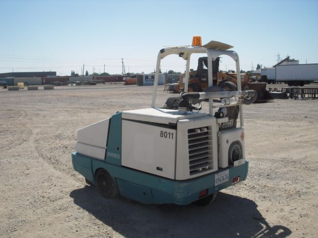 1999 Tennant 6550 Ride-On Indoor/Outdoor Sweeper