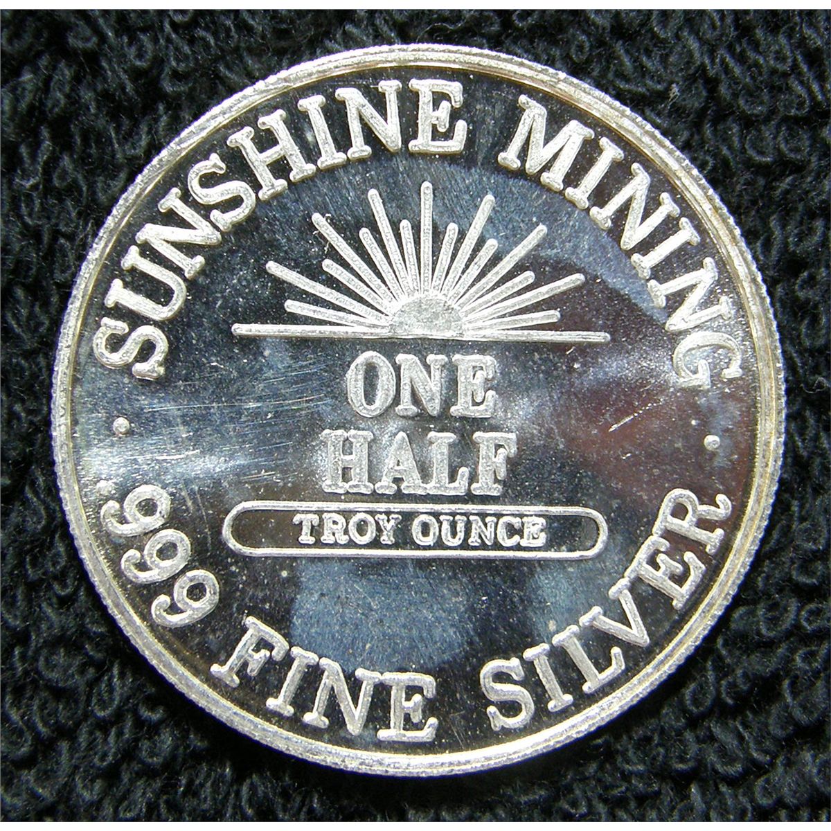 1984 Sunshine Mining One Half Troy Oz .999 Silver Round