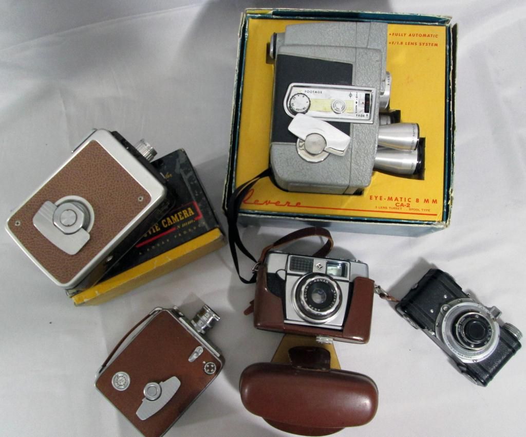 Lot Of Vintage Movie Cameras And Still Cameras