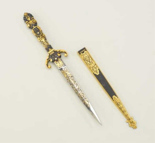 19th century dagger with chiseled steel hilt and gold Damascus ...
