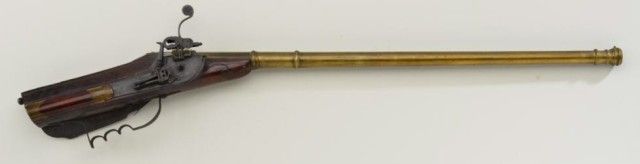 Unusual late Wheelock rifle with brass cannon type barrel and enclosed ...