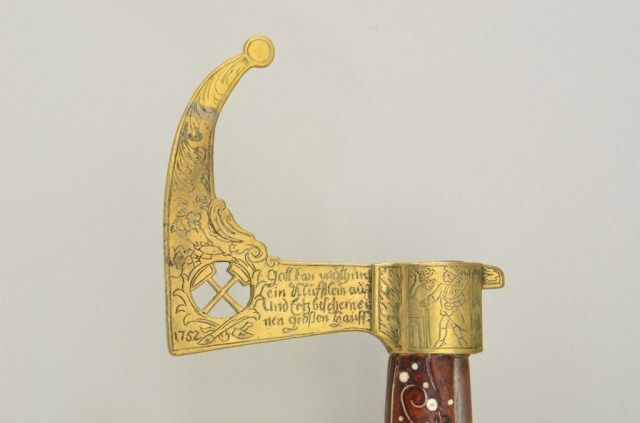 Miner’s axe with Flintlock pistol and ornately engraved and pierced ...
