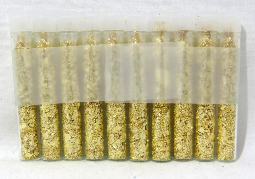 Ten small vials of gold Flakes