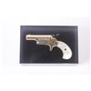 Gun PaperweightShows a Butler .31 Caliber black powder gold derringer ...