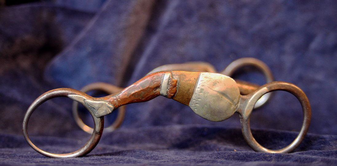 McChesney lady leg bit, silver, copper and brass mtd., some loose ...