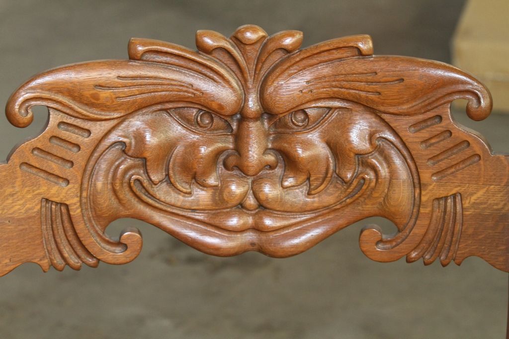 Antique Chair with Carved Face.