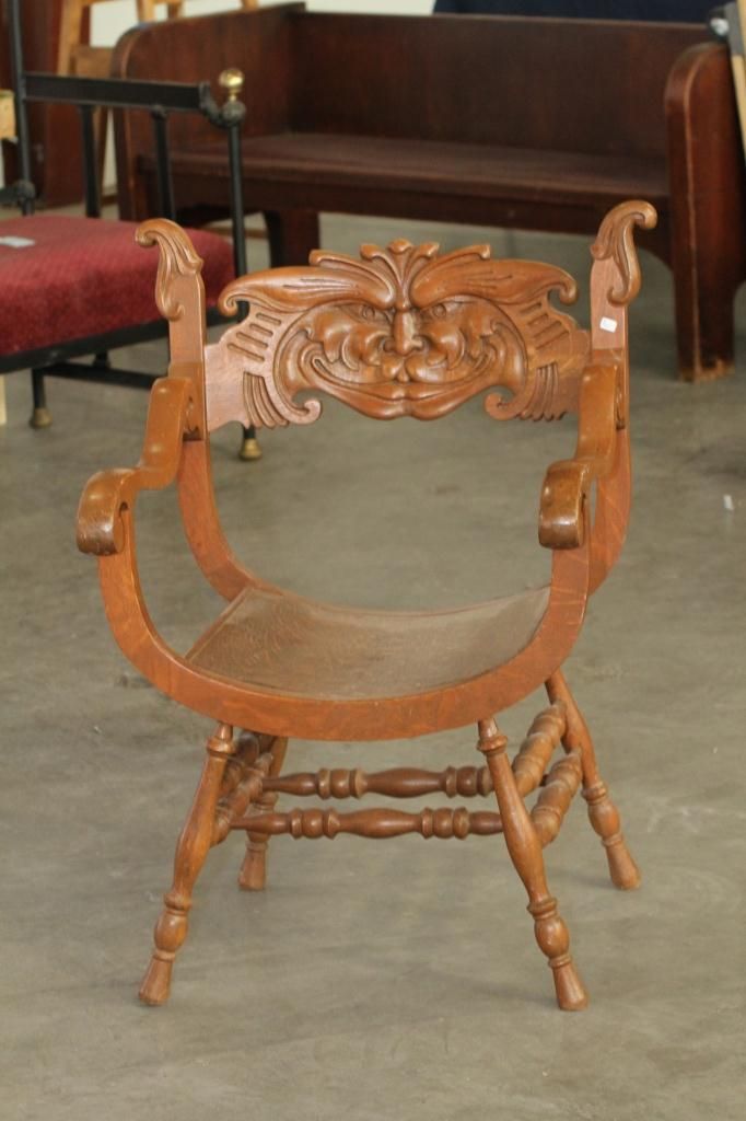 Antique Chair with Carved Face.