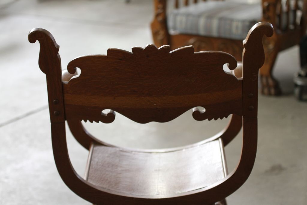 Antique Chair with Carved Face.