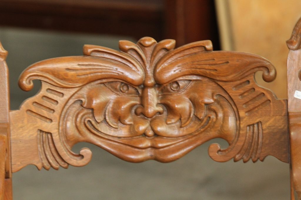 Antique Chair with Carved Face.