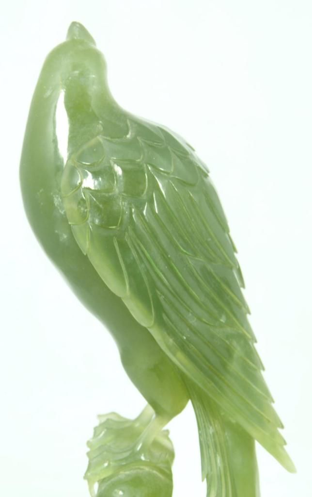 A PAIR OF CHINESE CARVED JADE BIRD FIGURES