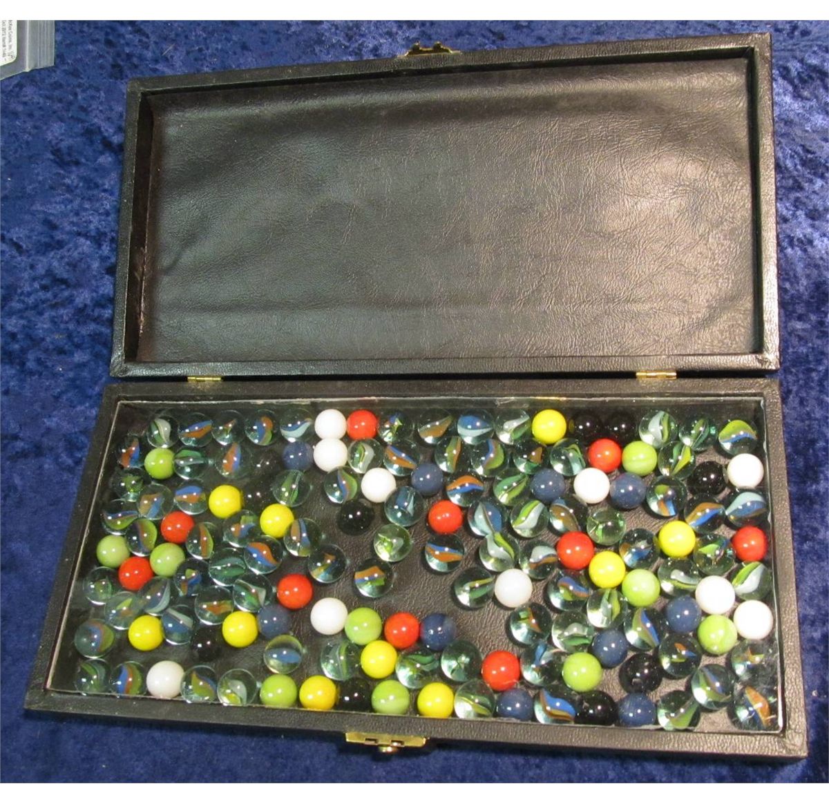 1648. Display Case with over 100 Marbles.