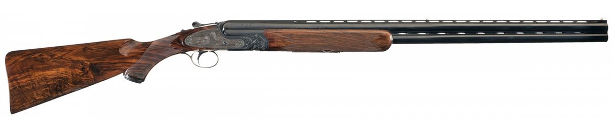 Engraved Sabatti Over/Under Shotgun with Leather Case and Accessories