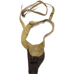 Unmarked leather skeleton rig shoulder holster.