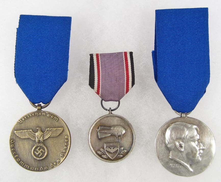 LOT OF 3 GERMAN NAZI MEDALS W/ RIBBONS