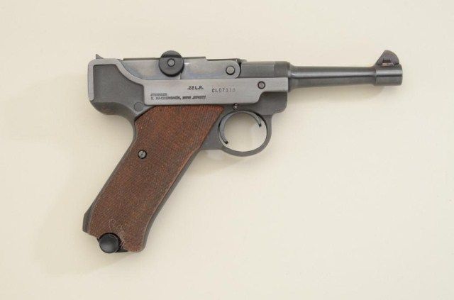 Luger semi-auto pistol by Stoeger , .22LR cal., black finish, checkered ...