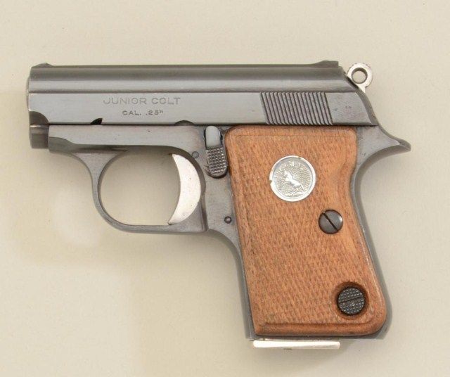 Colt Junior pocket semi-auto pistol, .25 cal., blue finish, checkered ...