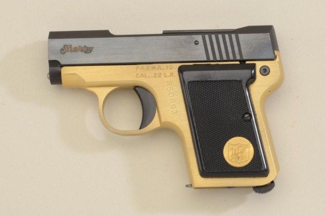 Wilkinson Arms pocket semi-auto pistol, .22LR cal., gold and black ...