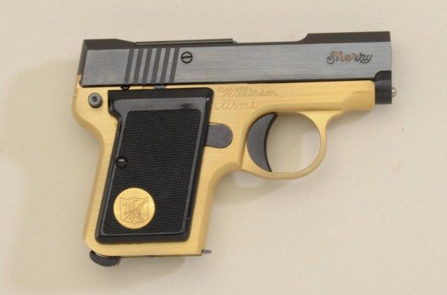 Wilkinson Arms pocket semi-auto pistol, .22LR cal., gold and black ...