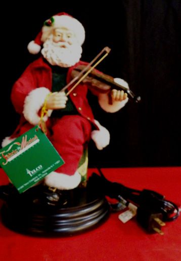 Fabric in Motion Santa Santa Playing the Violin Santa is approx 12" tall