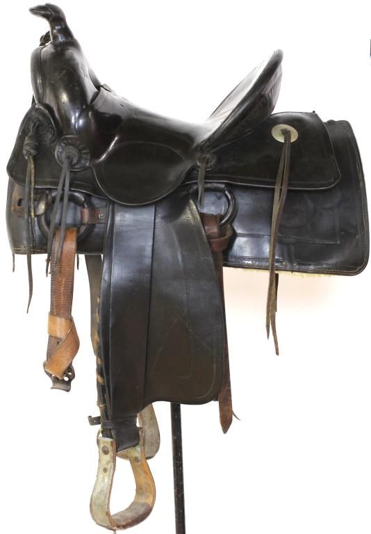Big black Duhamel saddle, square skirt,