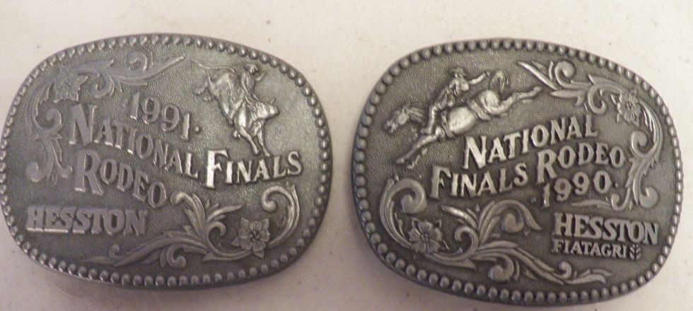 2- NFR Belt Buckles 1990 &1991 national finals Rodeo Hesston Belt Buckles