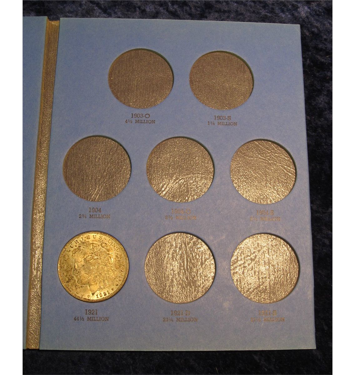 762. 1921 P Morgan Silver Dollar. Full dark toned Uncirculated. In a ...