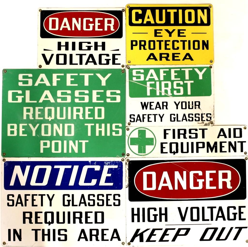 Collection of 7 contemporary metal safety signs.