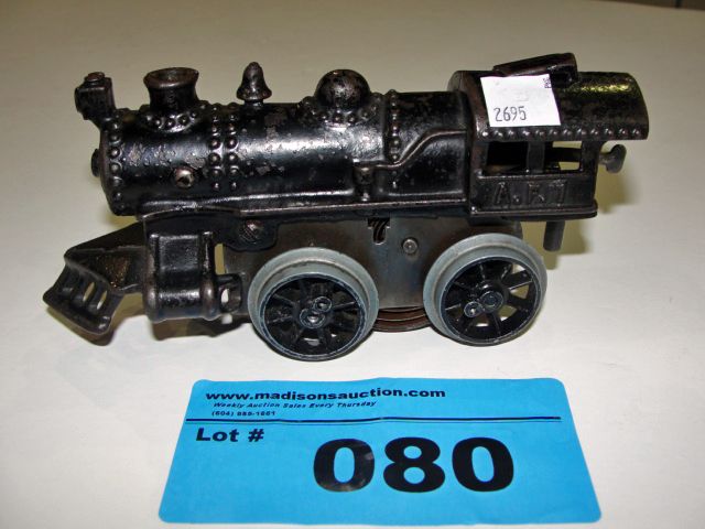 Vintage cast metal wind up toy train