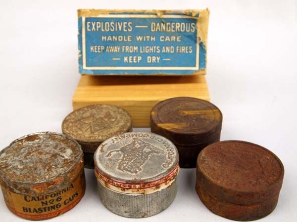 Collection of Circular Blasting Cap Tins in Box