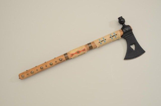 Reproduction metal tomahawk with decorated wood shaft; a great ...