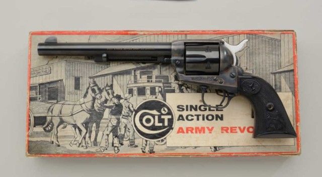 Colt SAA revolver in factory “Stagecoach” black, red and white ...