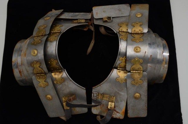 Lot of Roman style armor including breast and back plates, shoulder and ...