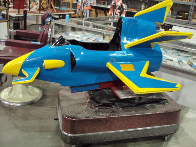 Rocketship mechanical coin operated kiddie ride