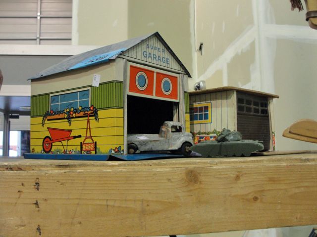 2 tin toy lithograph garage buildings, toy tank