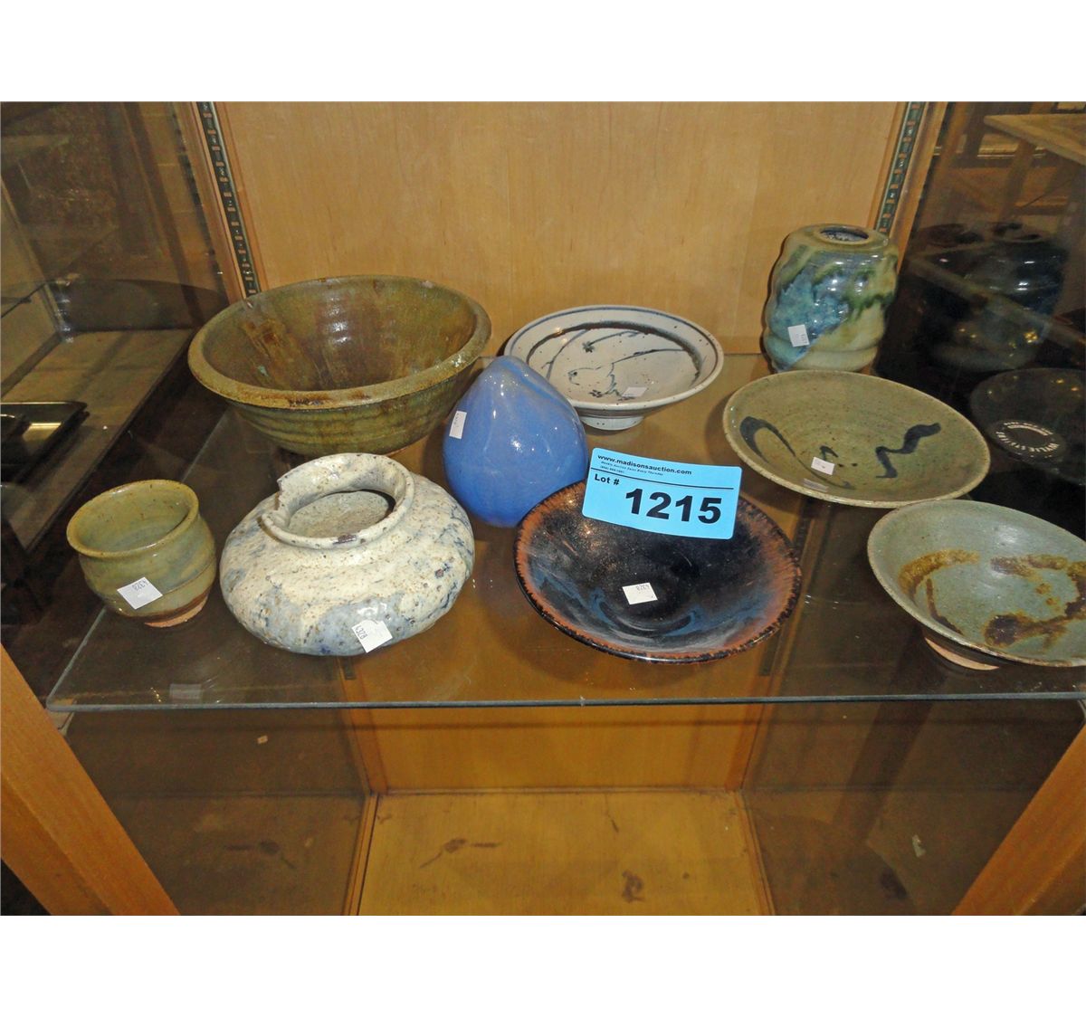 Shelf lot of assorted art pottery pieces